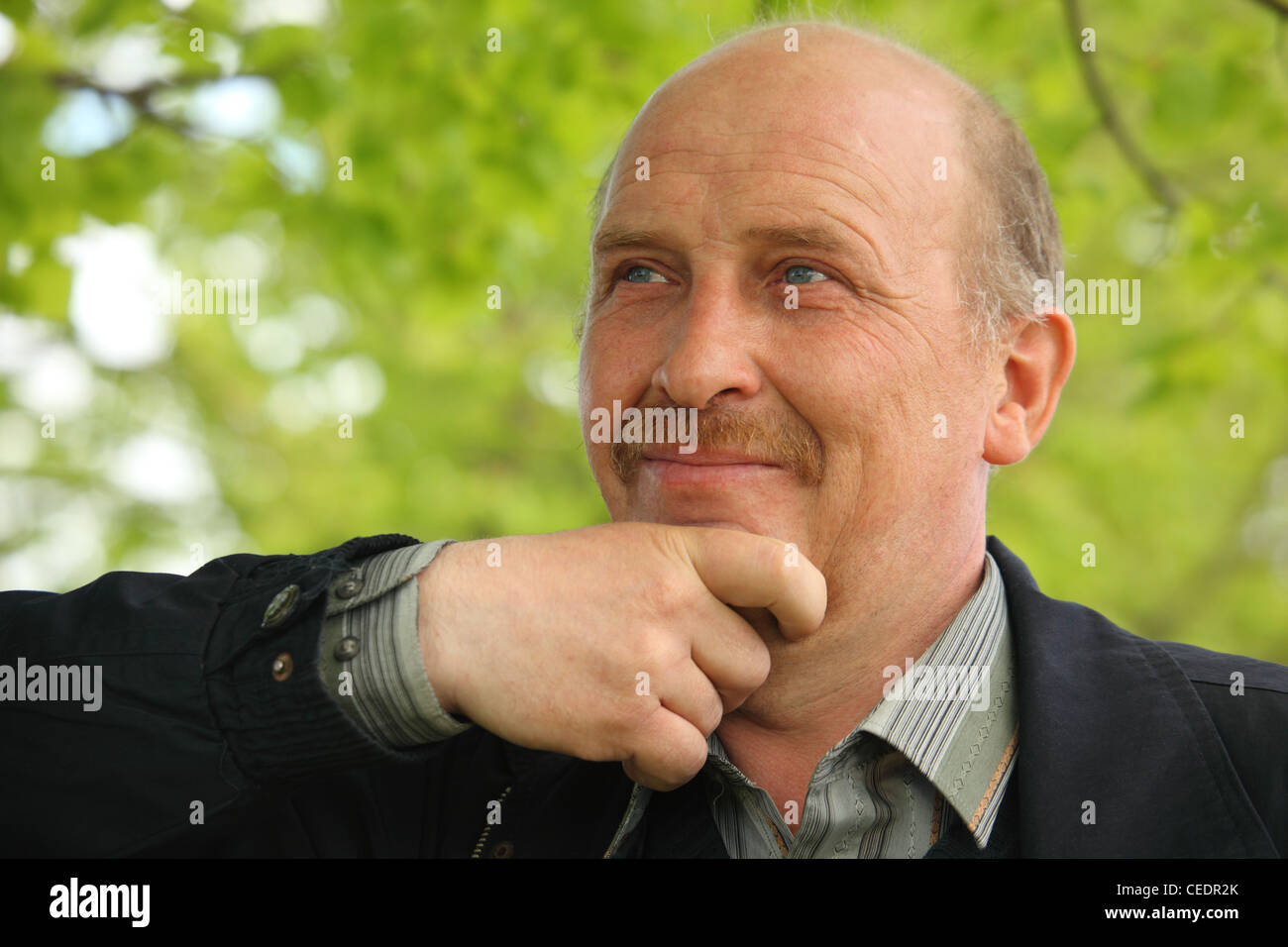 portrait of mature middleaged smiling man outdoor Stock Photo - Alamy