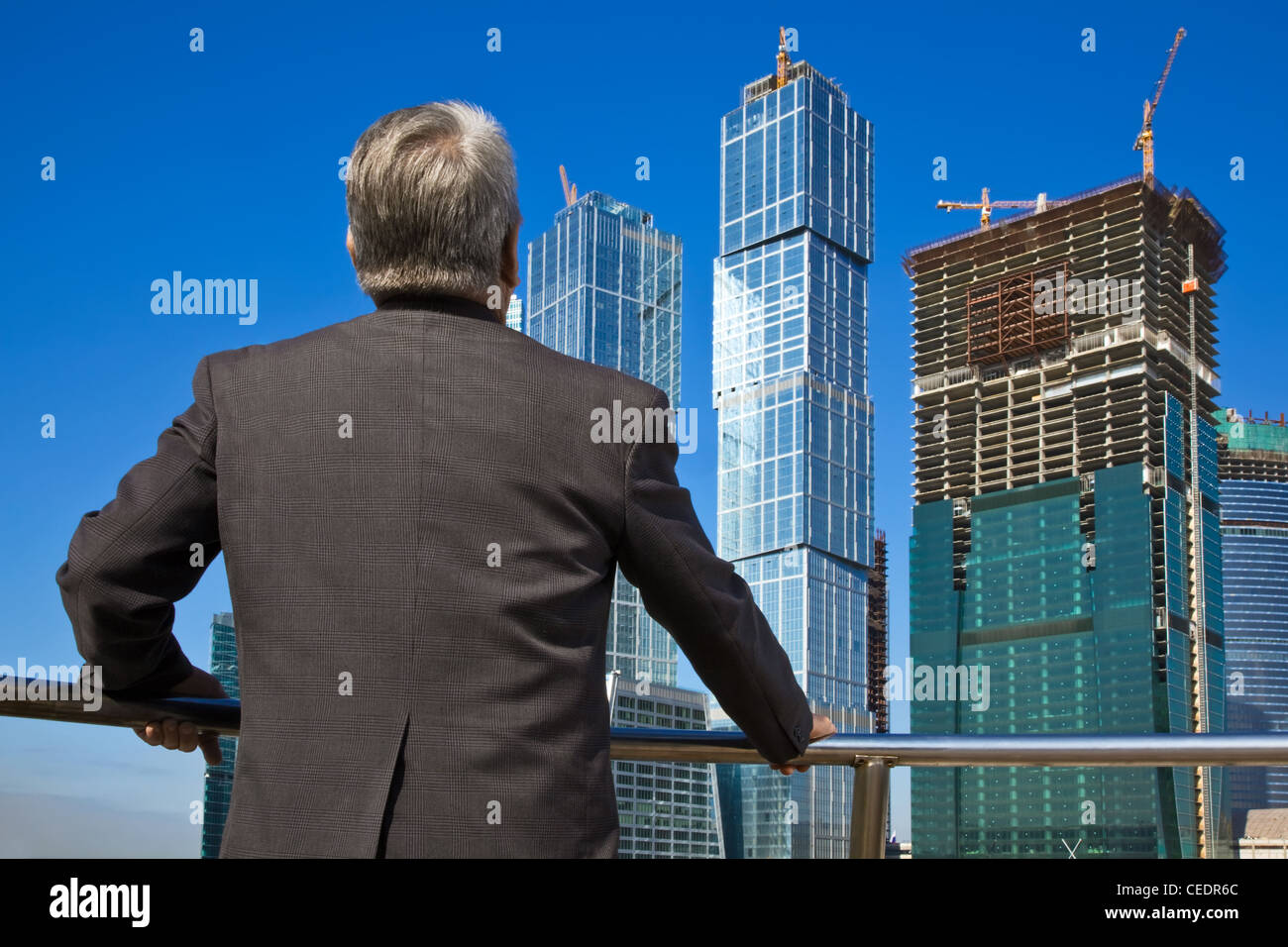 behind Senior man at the building Stock Photo - Alamy