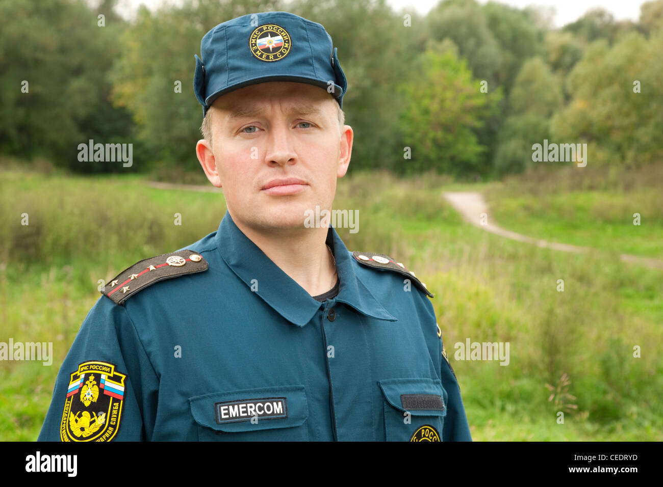 officer of rescue service standing on footpath outdoors Stock Photo - Alamy
