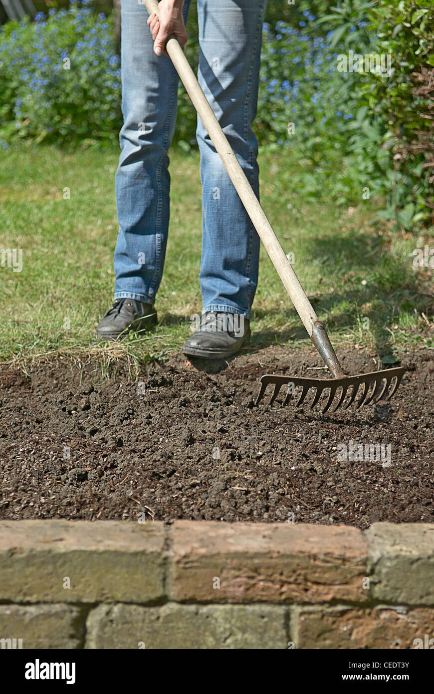 Rake soil hi-res stock photography and images - Alamy