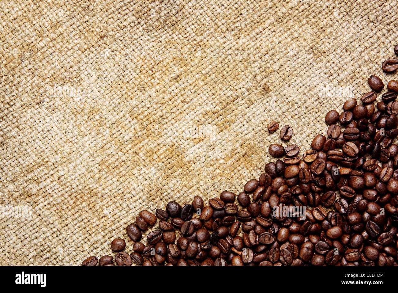 Coffee beans on traditional sack textile Stock Photo - Alamy