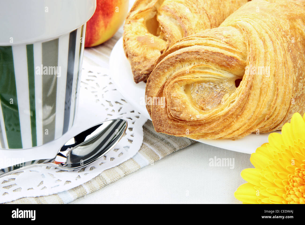 Fresh croissant & more on breakfast table Stock Photo - Alamy