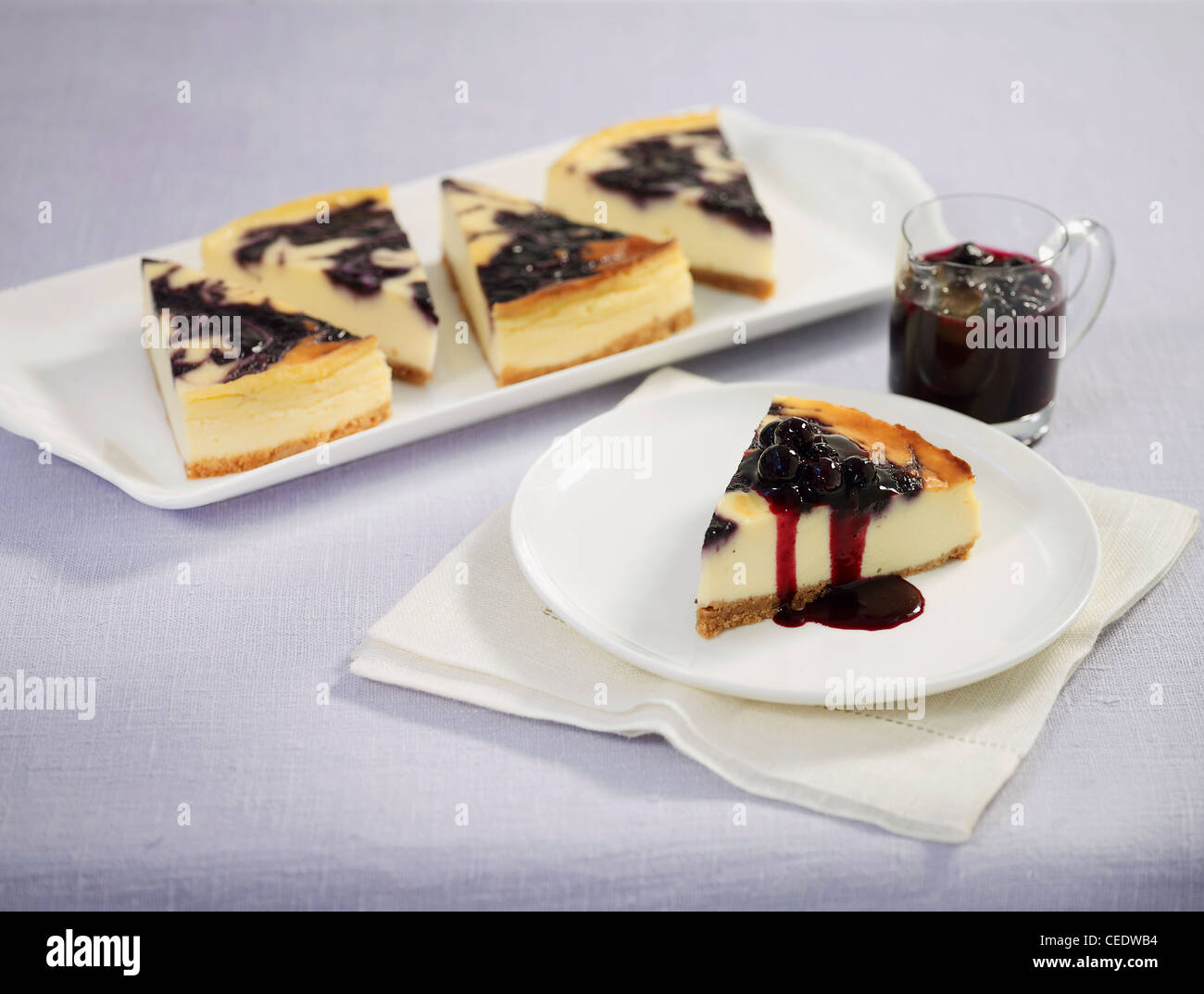 Blueberry ripple cheesecake Stock Photo - Alamy