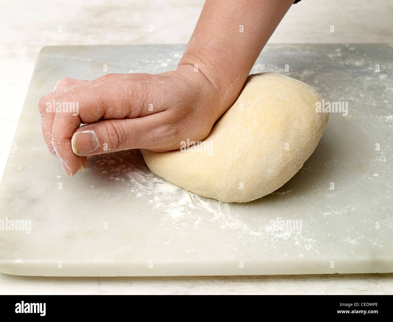 Kneading pasta dough Stock Photo - Alamy