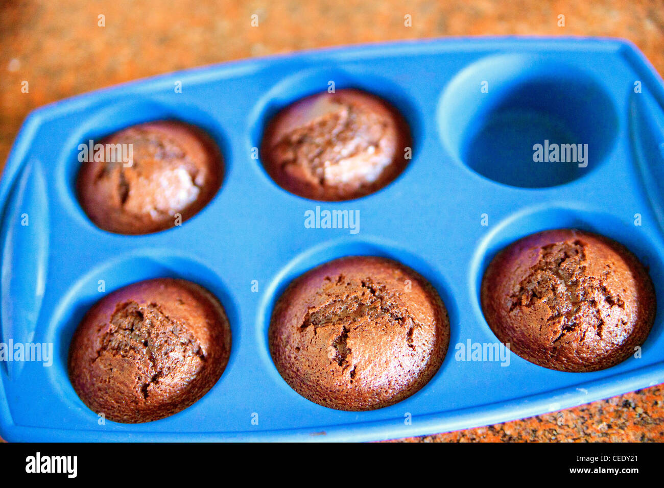 Baking chocolate muffins Stock Photo - Alamy