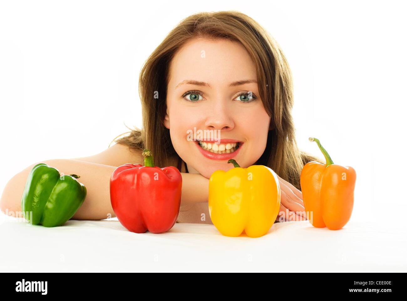 happy woman eating peppers Stock Photo - Alamy