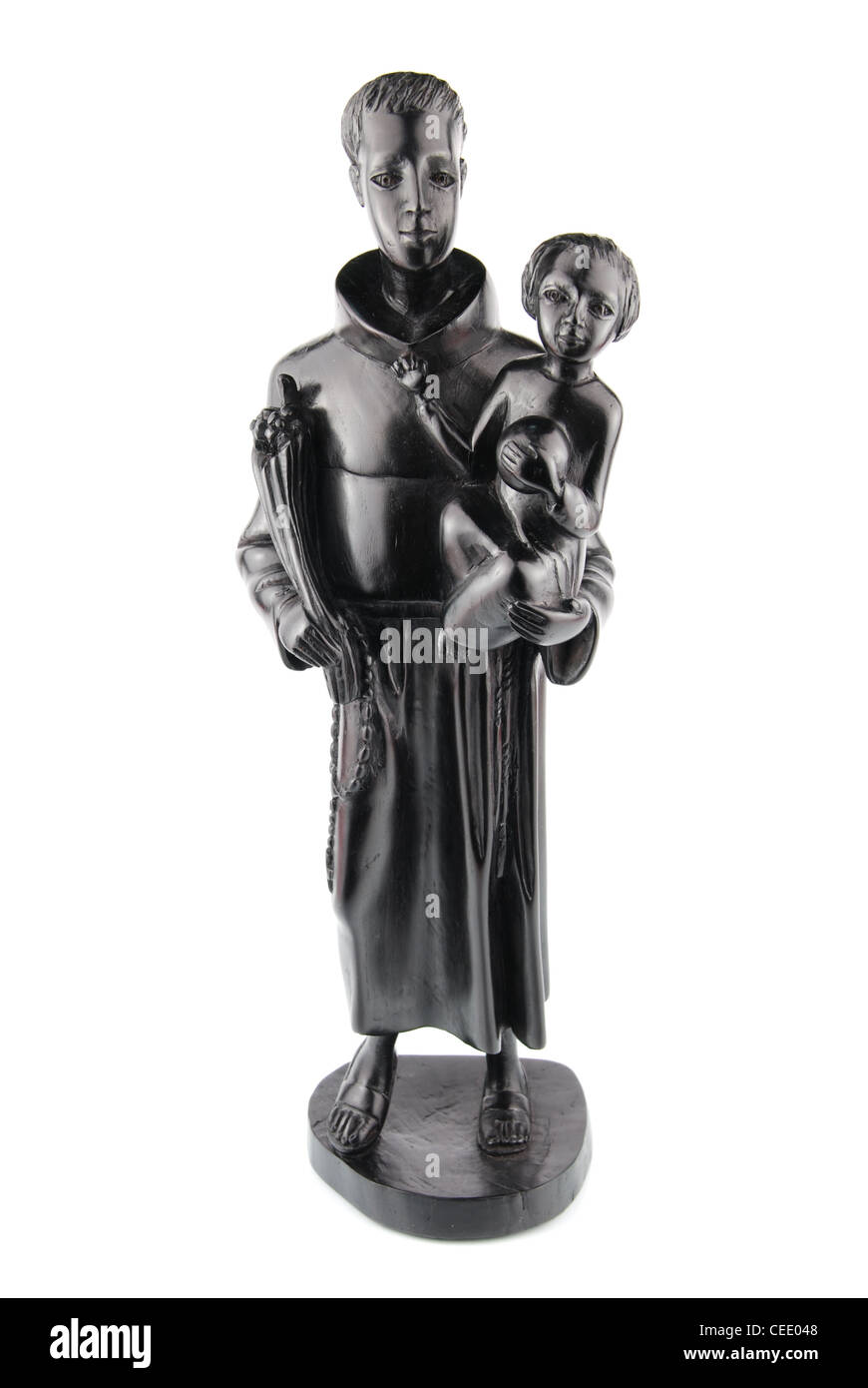 religious blackwood figurine of Saint Anthony and Jesus isolated on ...