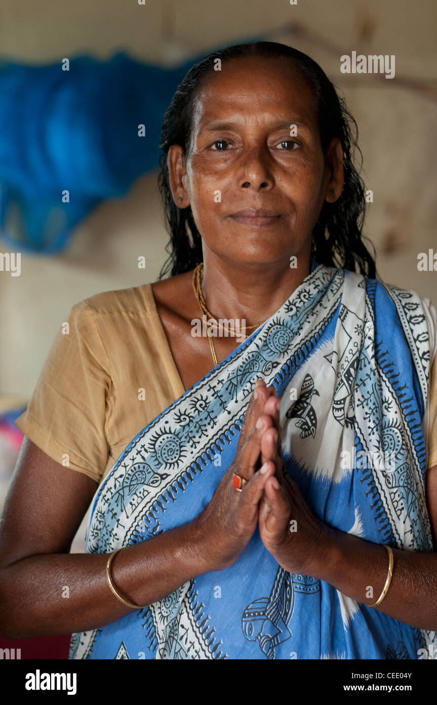 Portrait of a widow with hands clasped in prayer, Chatanya Bihar ashram ...