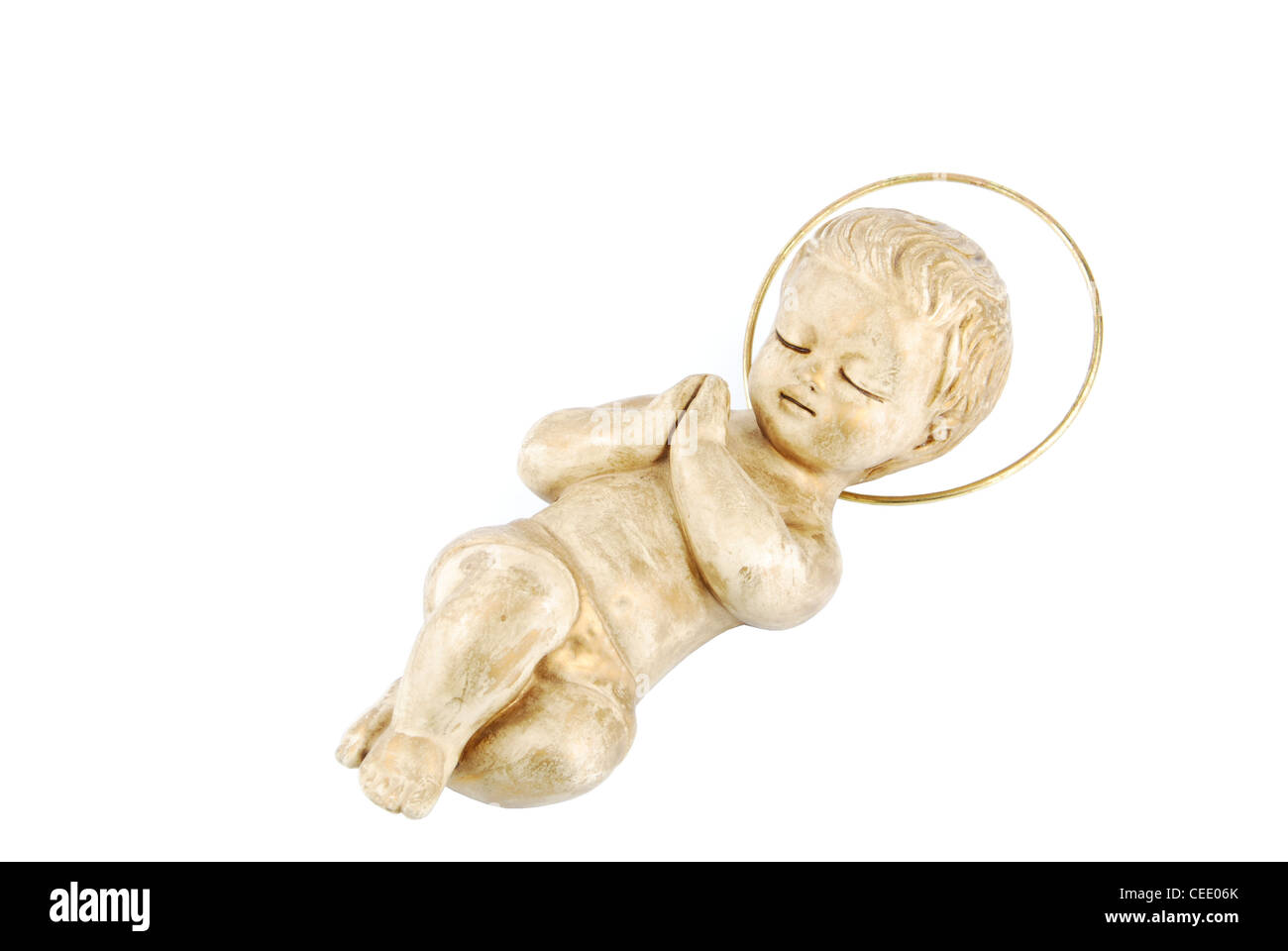 golden figure of baby jesus isolated on white background Stock Photo ...