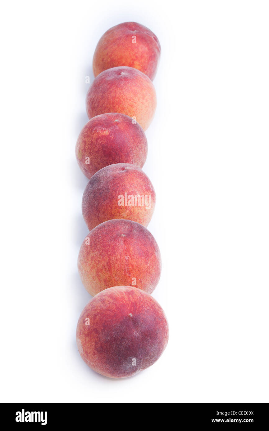 Line of peaches Stock Photo - Alamy