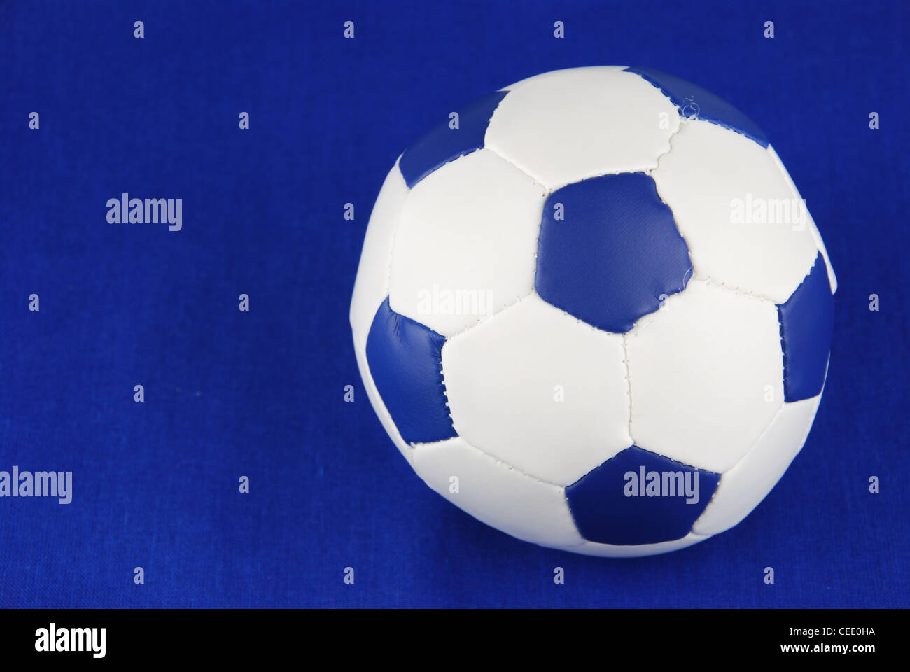 blue soft soccer ball for children on blue background Stock Photo - Alamy