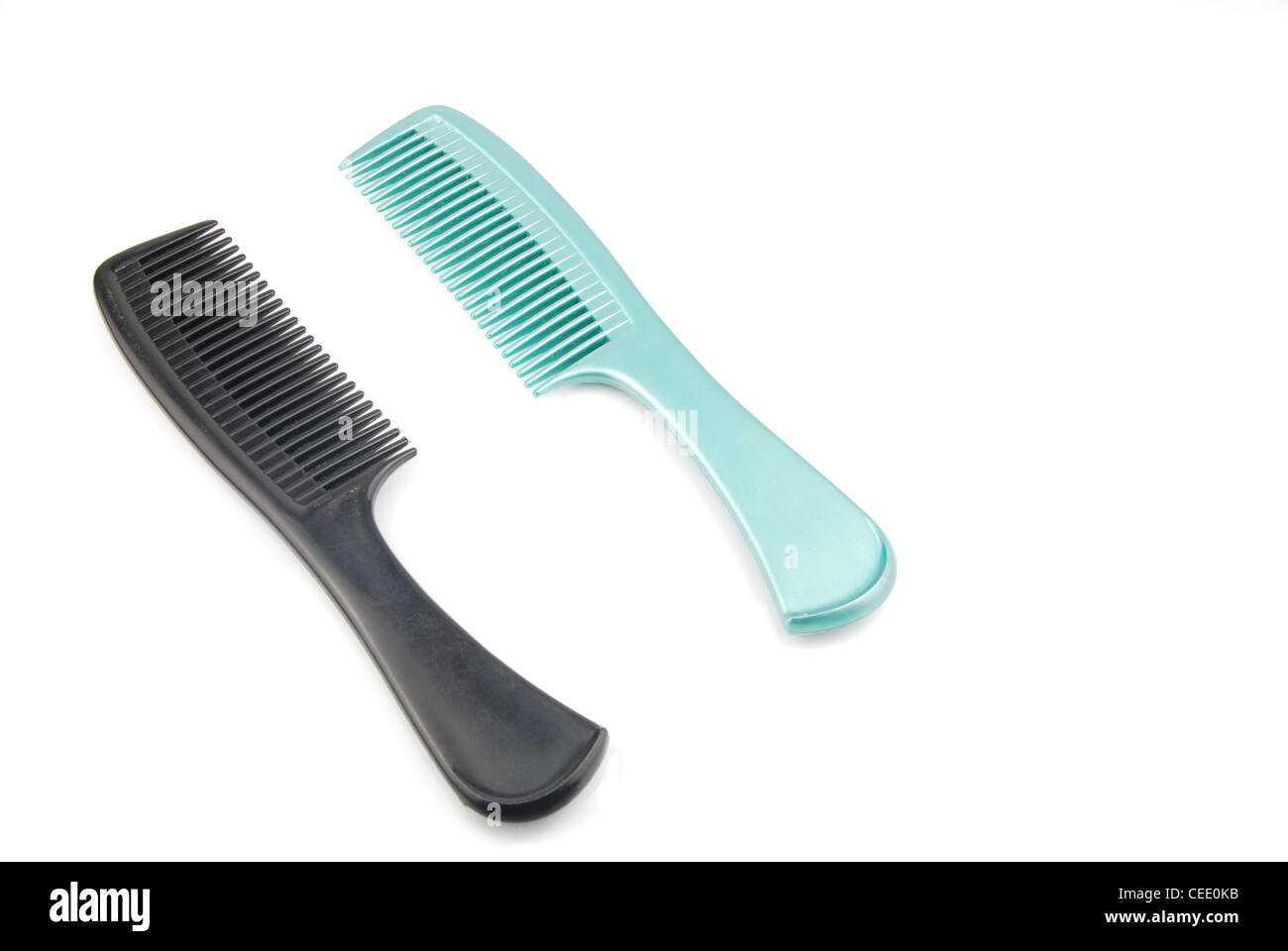 green and black plastic combs isolated on white background Stock Photo ...
