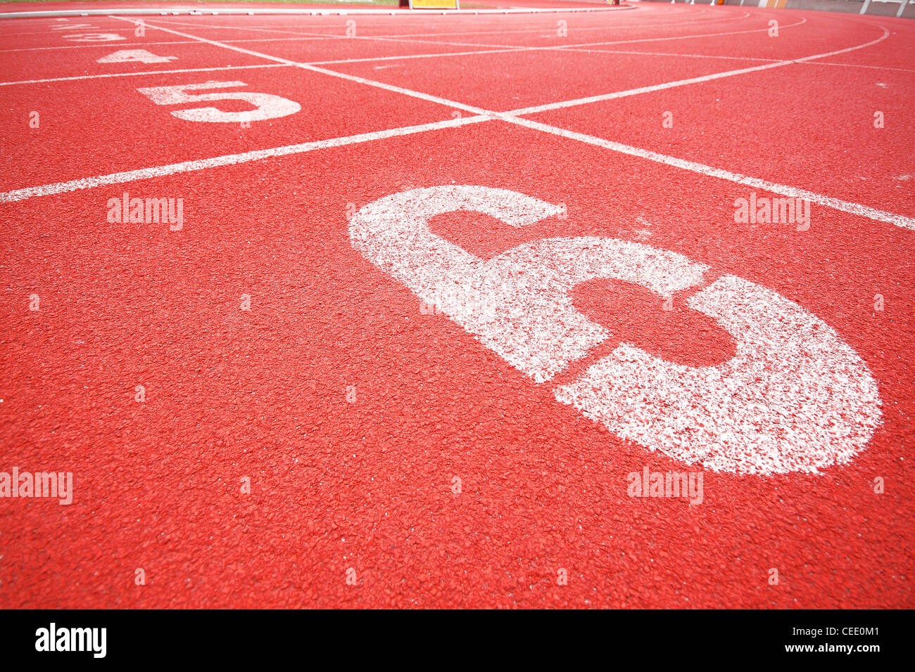 Running track four blue hi-res stock photography and images - Alamy