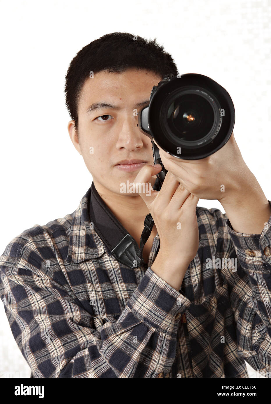 Male photographer holding camera Stock Photo - Alamy