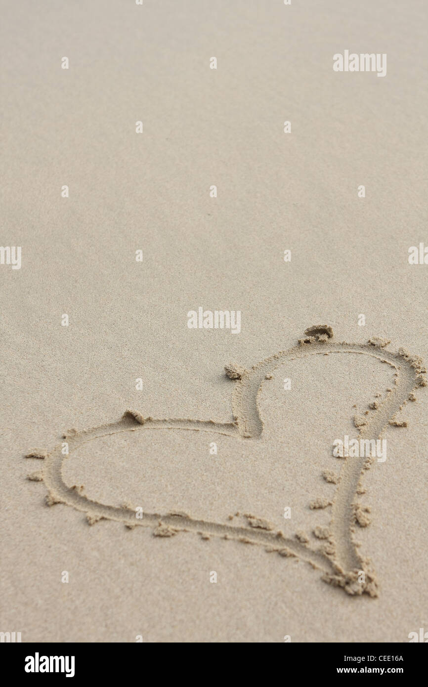 Heart drawn on sand Stock Photo - Alamy