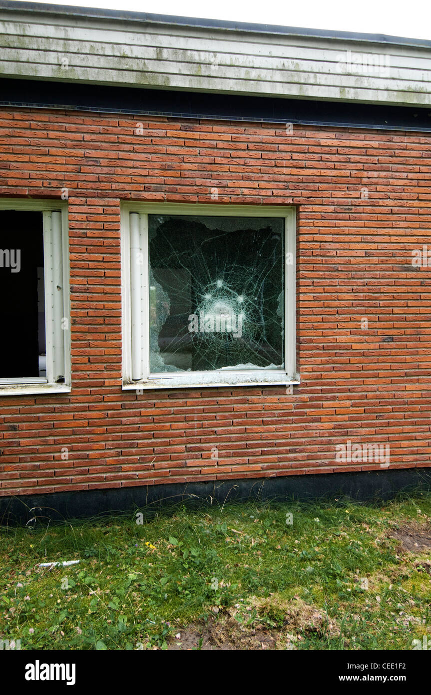 Broken window pane. Attempted burglary Stock Photo - Alamy