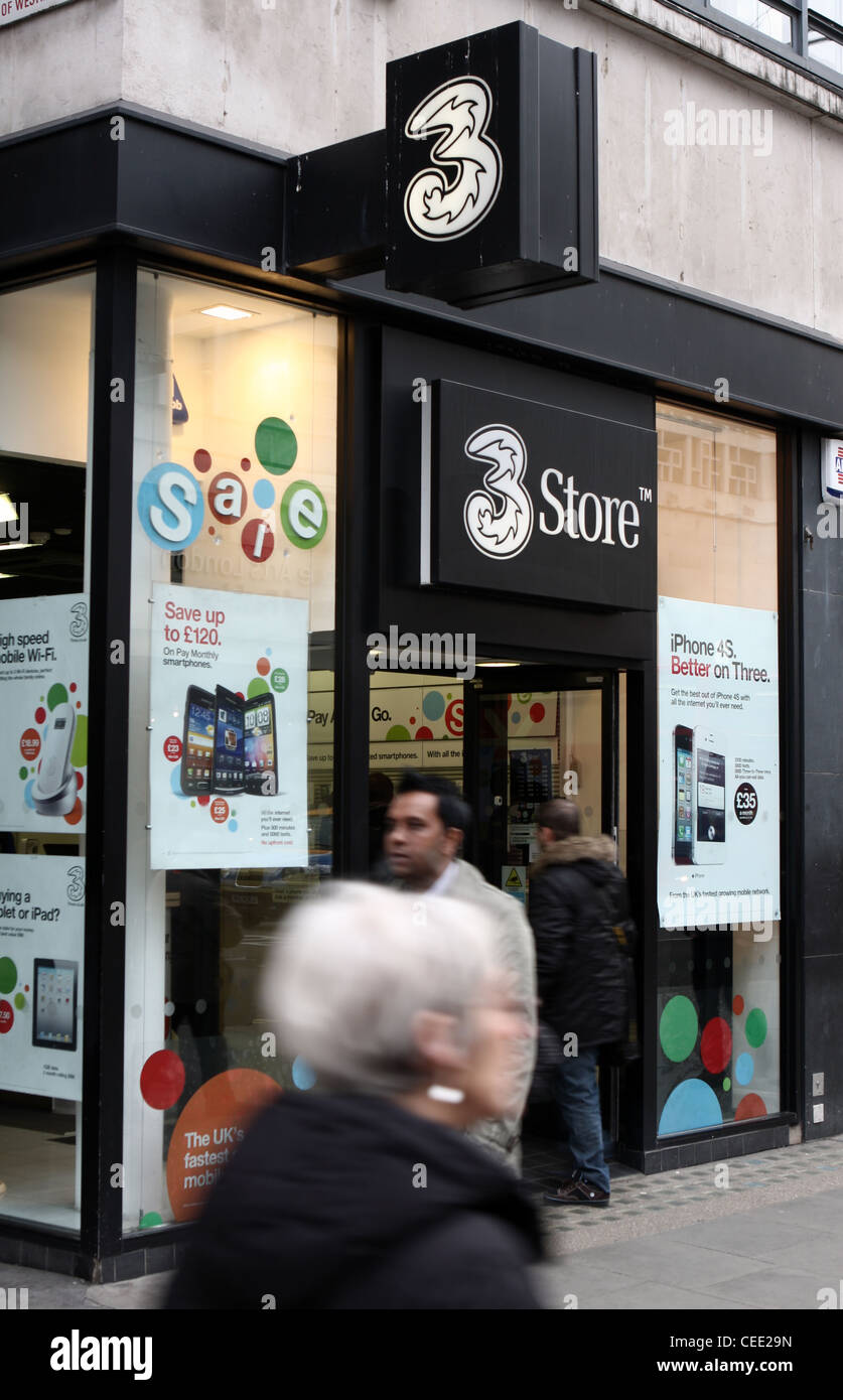 The entrance to a '3' store in Oxford Street, London with people ...