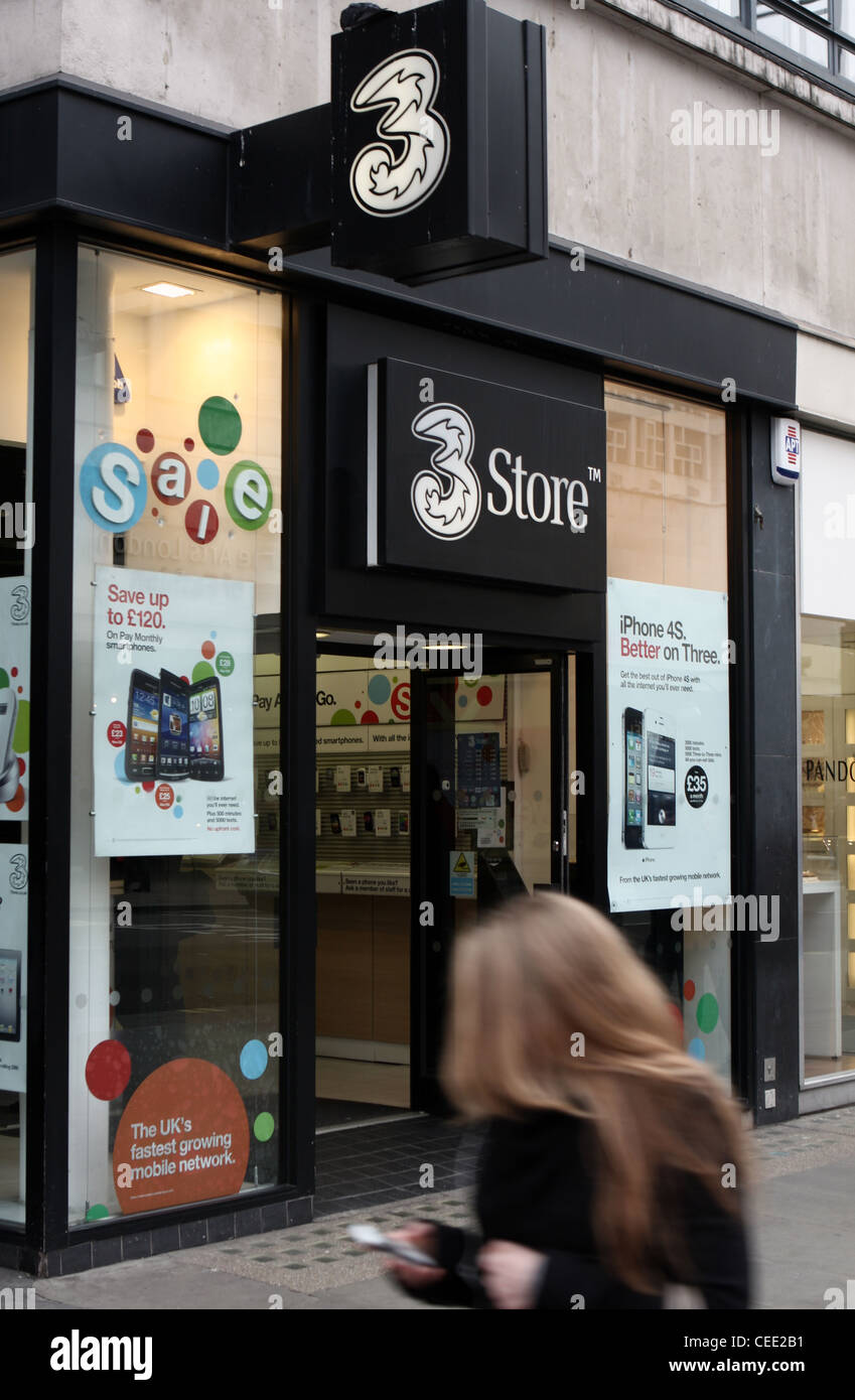 The entrance to a '3' store in Oxford Street, London with a female ...