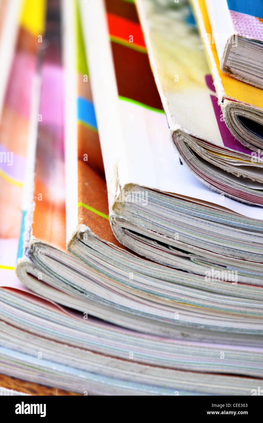 Pile of a colorful magazines close up Stock Photo - Alamy