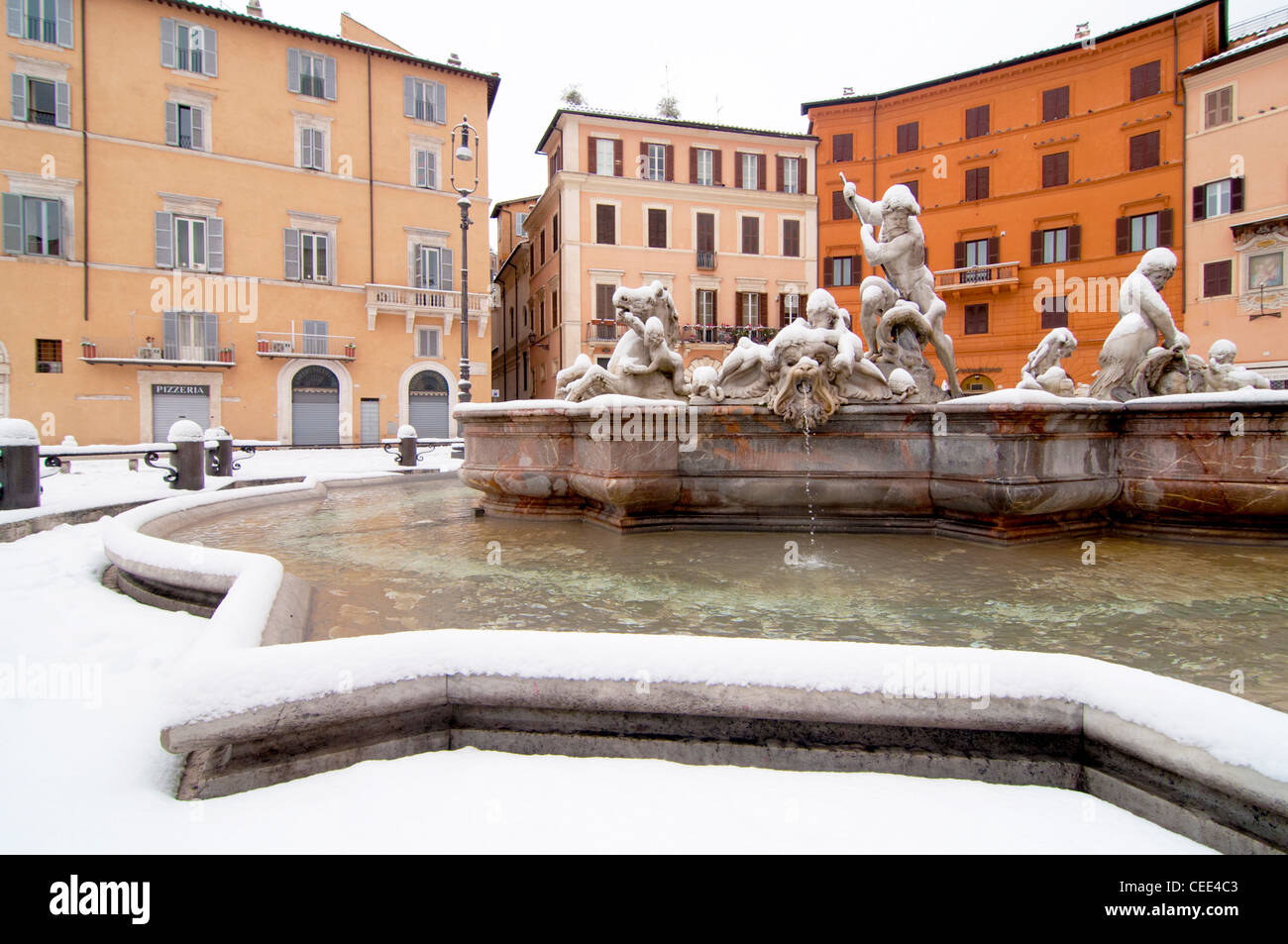 Snow covered view of the Fontana del Nettuno, Rome Stock Photo - Alamy
