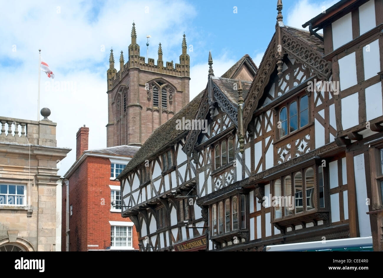 Half timbered building in Broad Street, Ludlow, with the tower of St ...