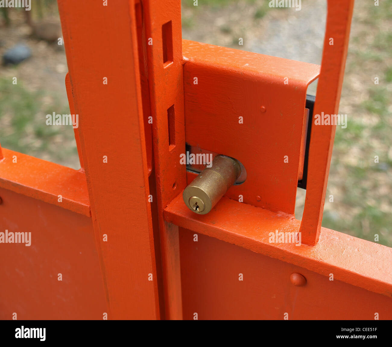 Door lock on a gate symbol of safety Stock Photo - Alamy