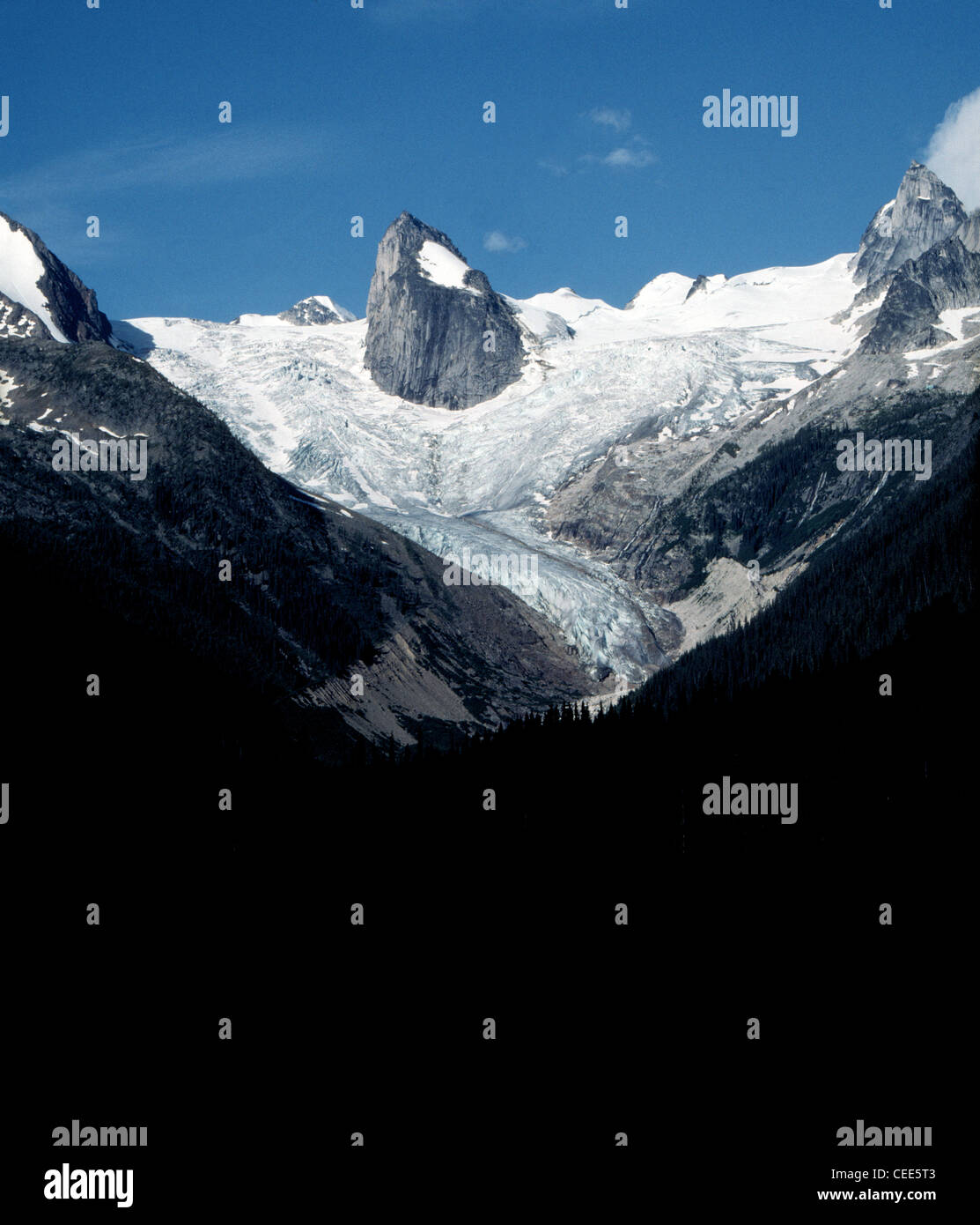 Bugaboo Glacier surrounds a pointy granite mountain peak in the Bugaboo ...