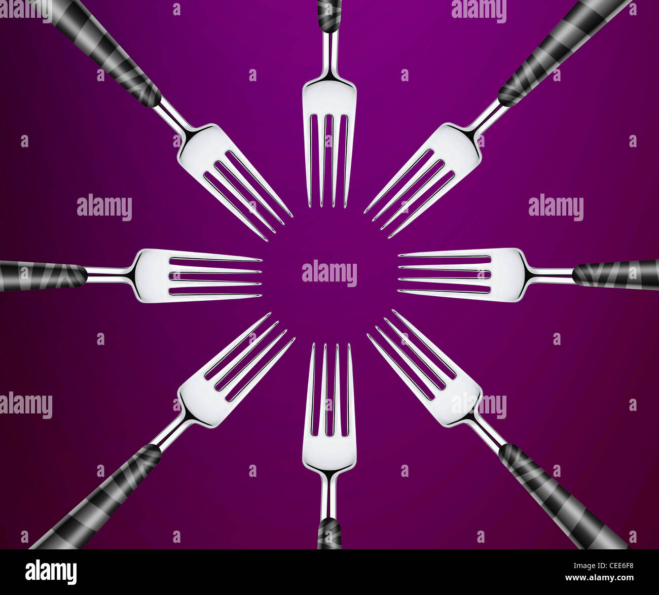 Set of forks creating circle shape on purble background Stock Photo - Alamy