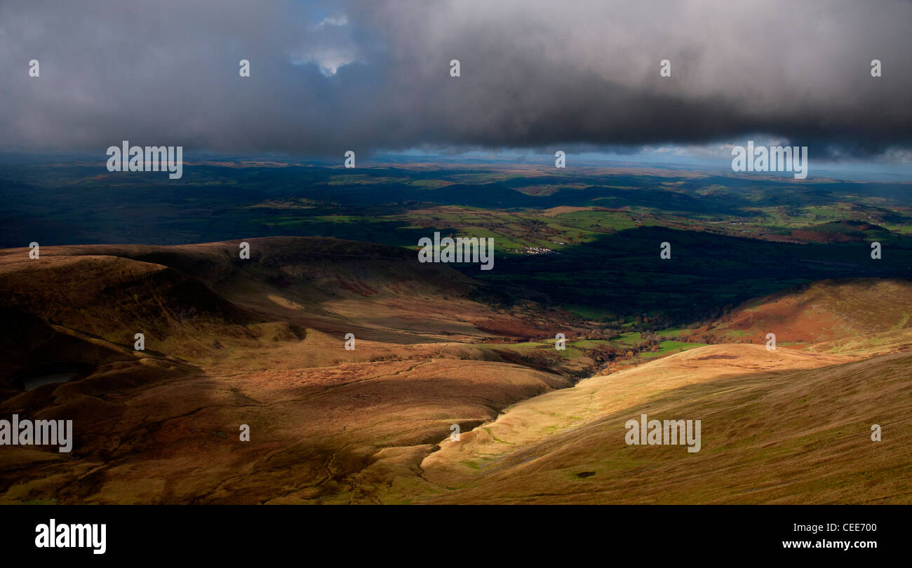 a landscape of the brecon beacons of a approaching strom from pen y fan ...
