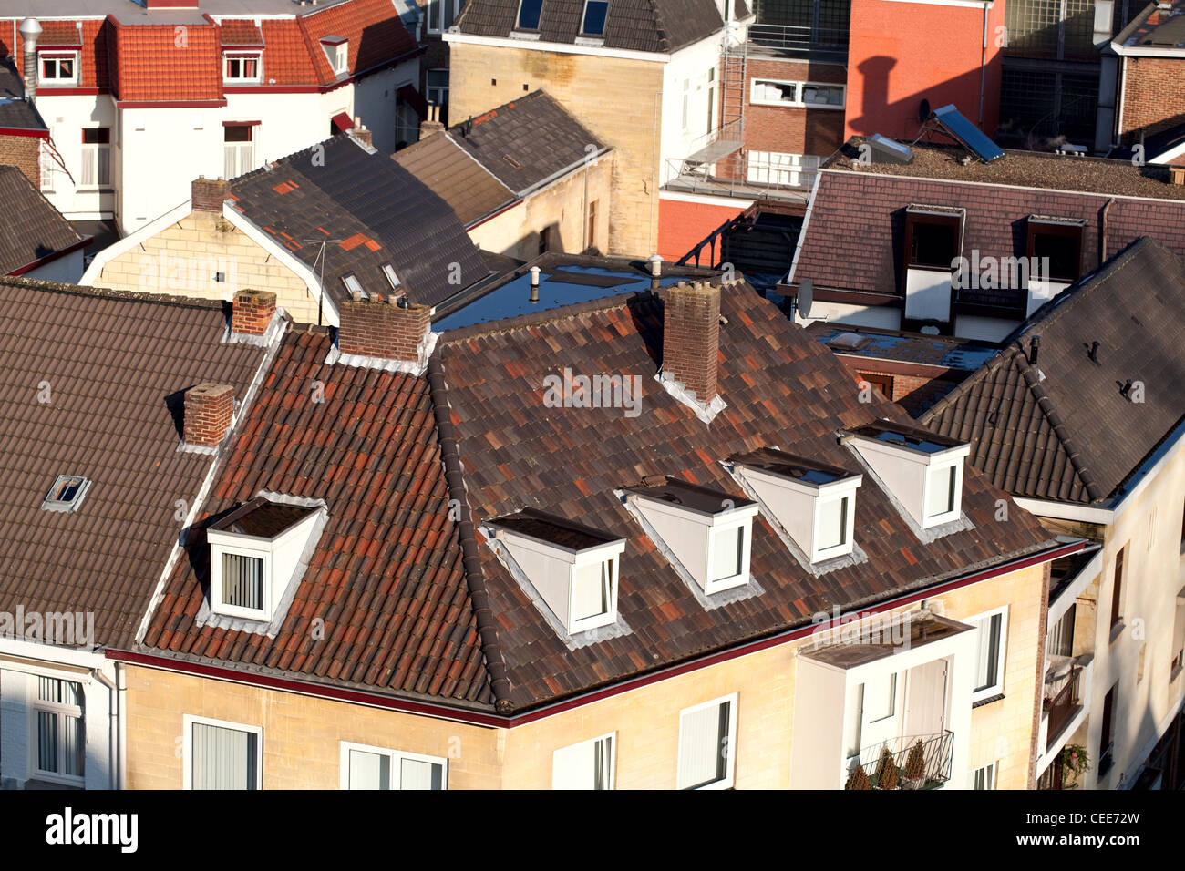 background of view red roofs in small town Stock Photo - Alamy