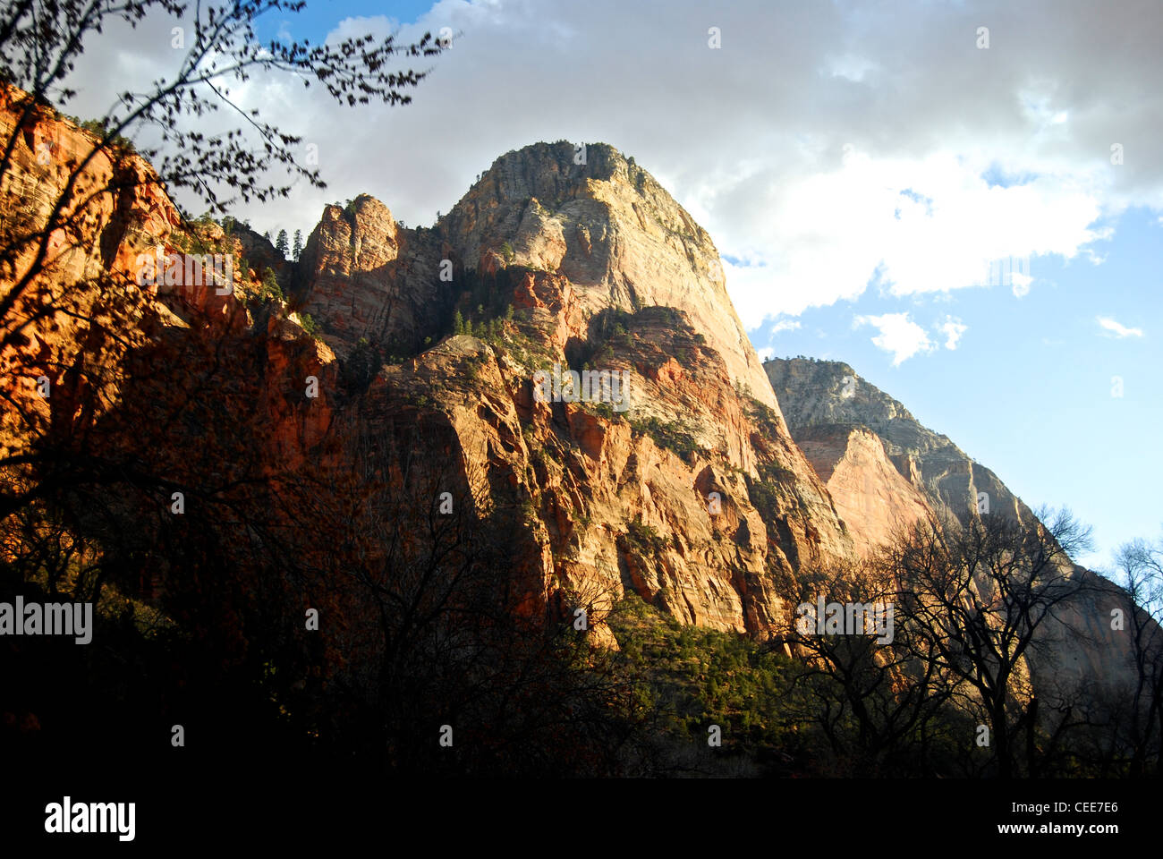 Sunlit Rock Face Stock Photo - Alamy