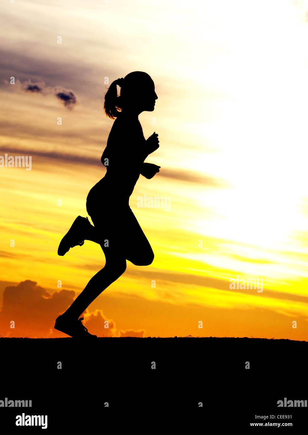 silhouette of a woman running Stock Photo - Alamy