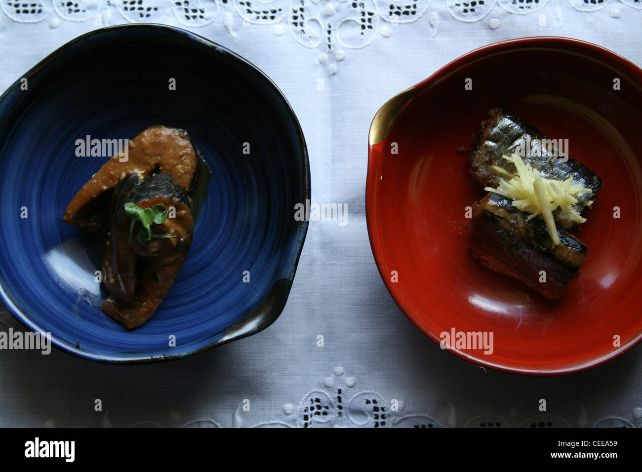 Grilled prepared authentic Japanese style fish with shredded ginger ...