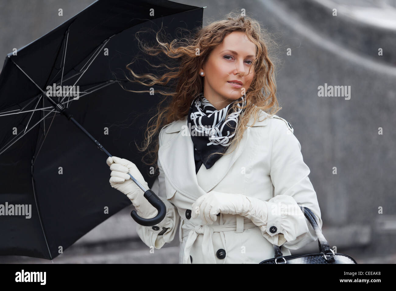 Woman in the wind Stock Photo - Alamy