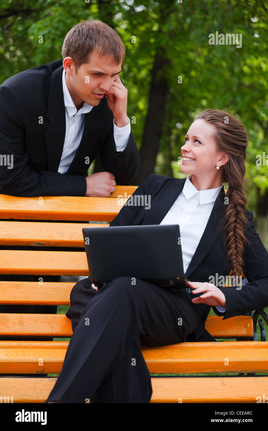 Young business people with laptop Stock Photo - Alamy