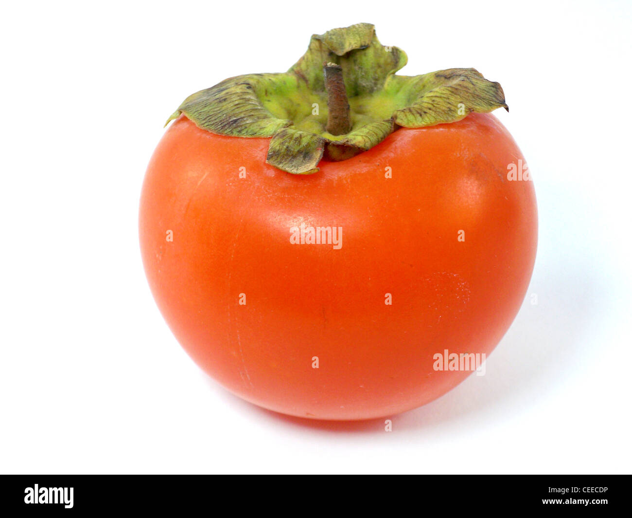 Ripe persimmons isolated on white background Stock Photo - Alamy