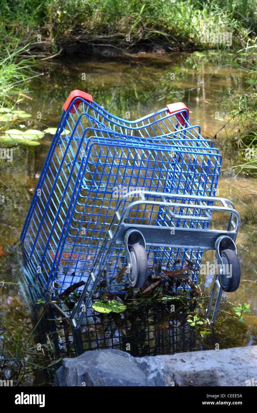 Shopping trolley pollution in river hi-res stock photography and images ...