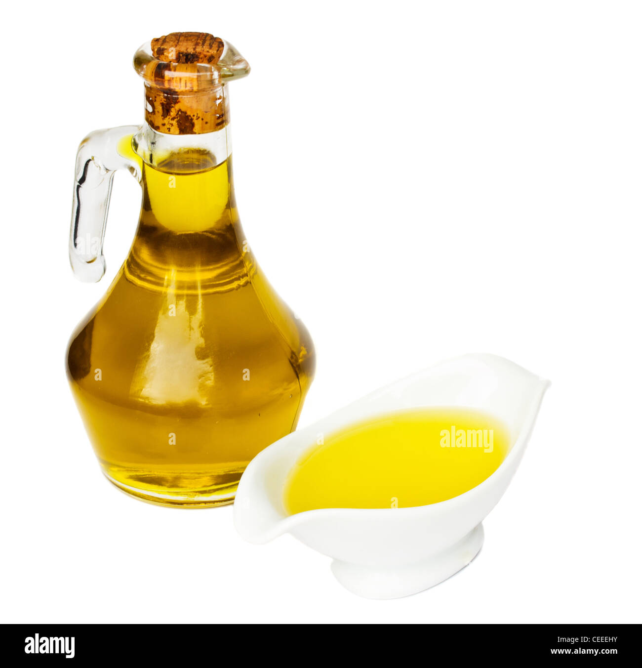 bottle of olive oil with saucer isolated on white background Stock ...