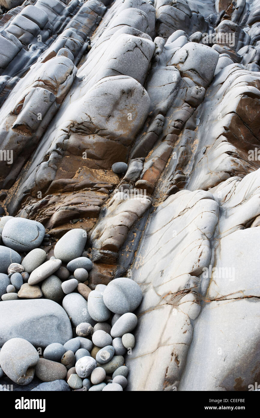 Close up of grey rock strata on the beach at Sandymouth, Cornwall, UK ...