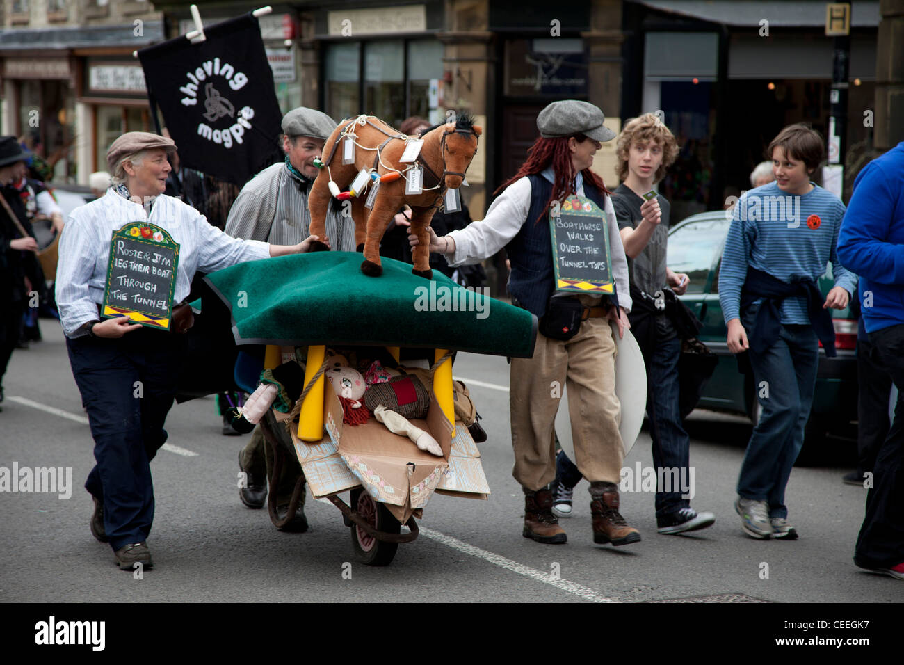 Wheelbarrow "floats" at the Marsden Cuckoo Festival, England Stock ...
