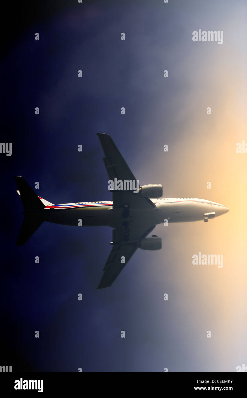 concept:out of dark (airplane flying out of dark Stock Photo - Alamy