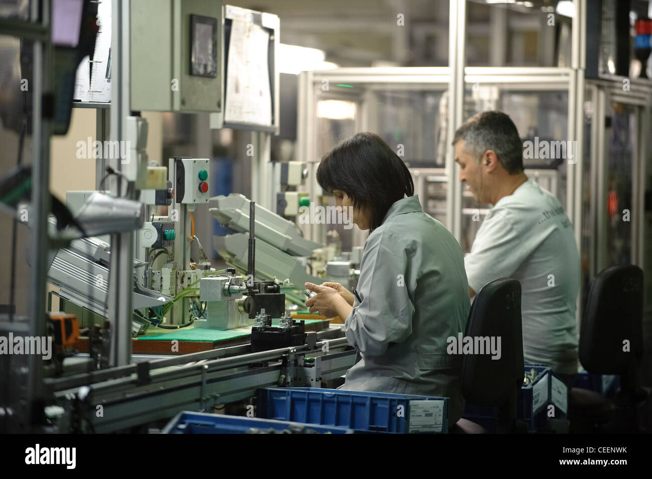 Factory workers at the assembly line Stock Photo - Alamy