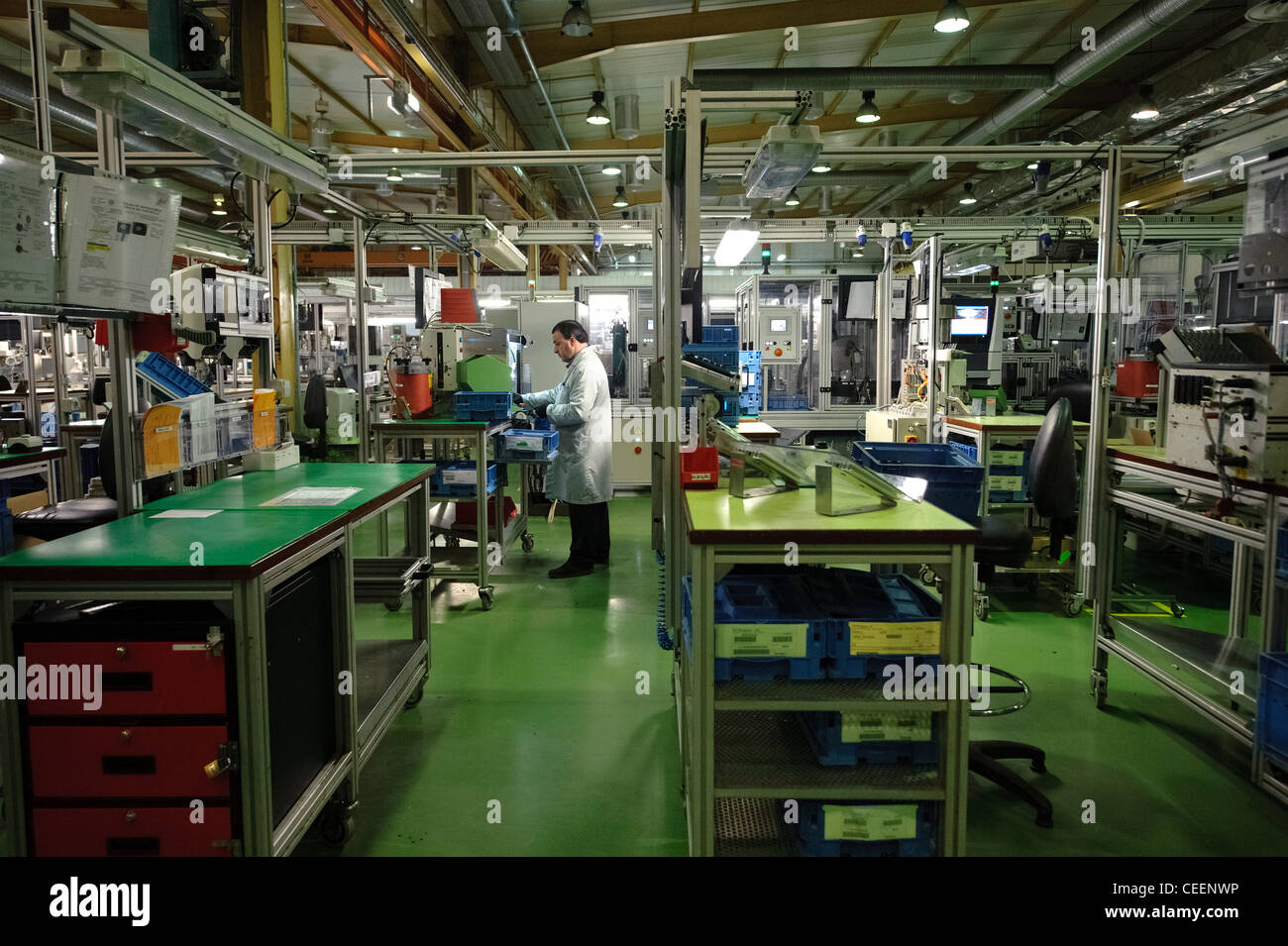 Factory workers at the assembly line Stock Photo - Alamy