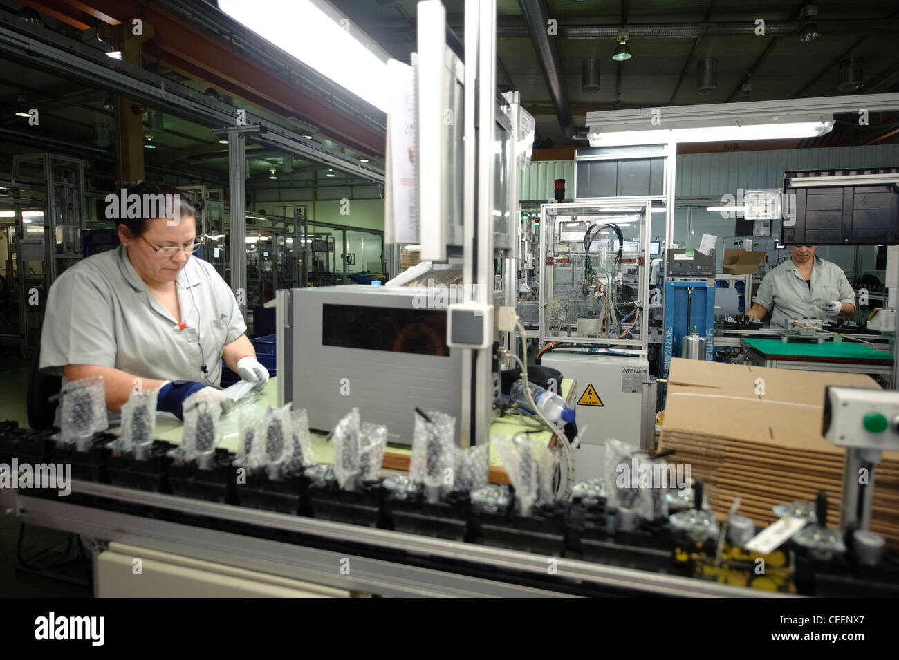Factory workers at the assembly line Stock Photo - Alamy