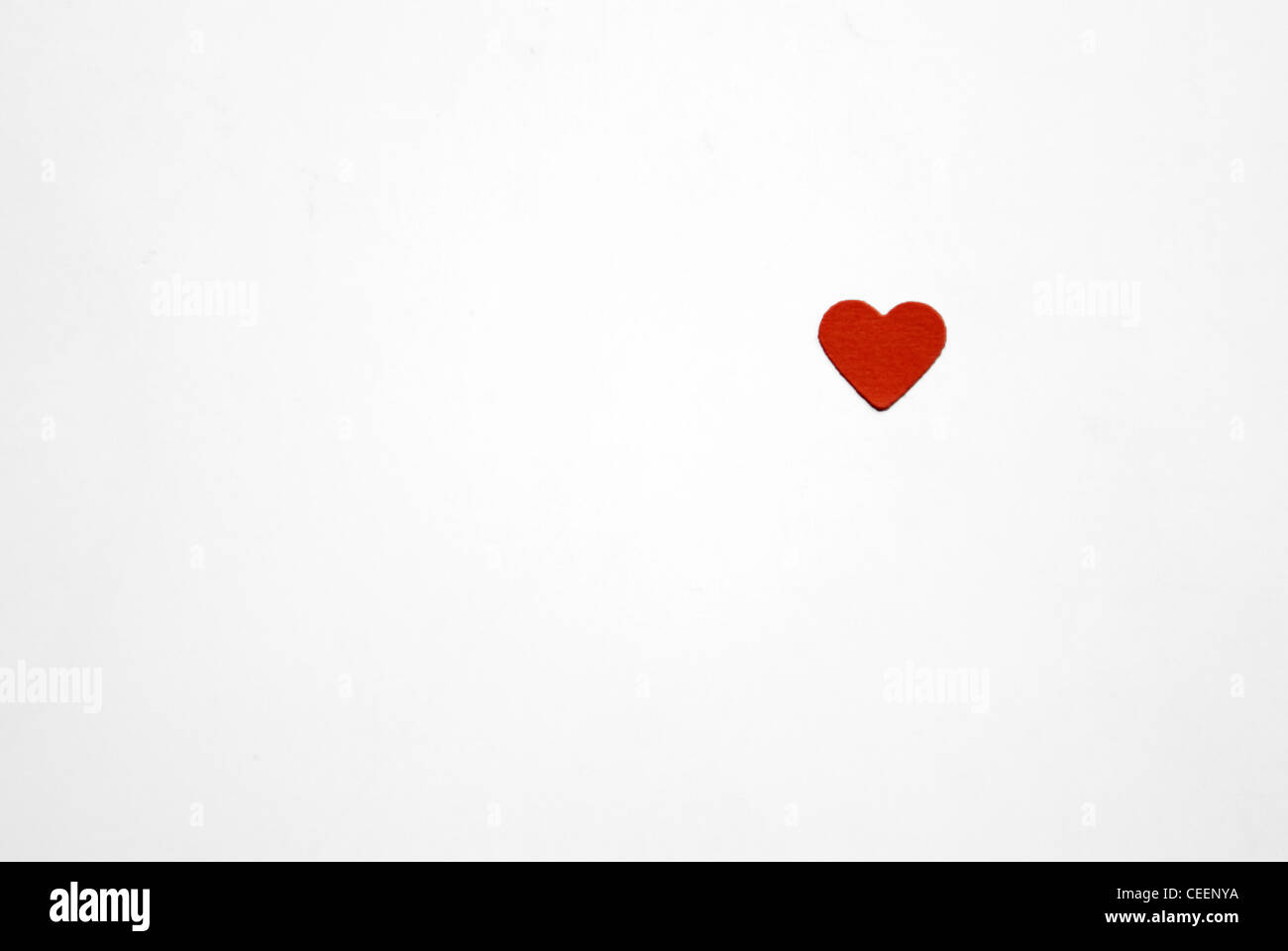 A single red heart Stock Photo - Alamy