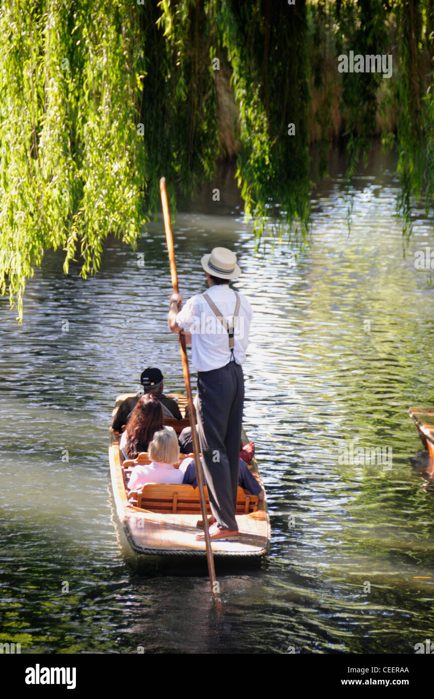 Visitors enjoying a punting experience on a punt on the Avon River in ...