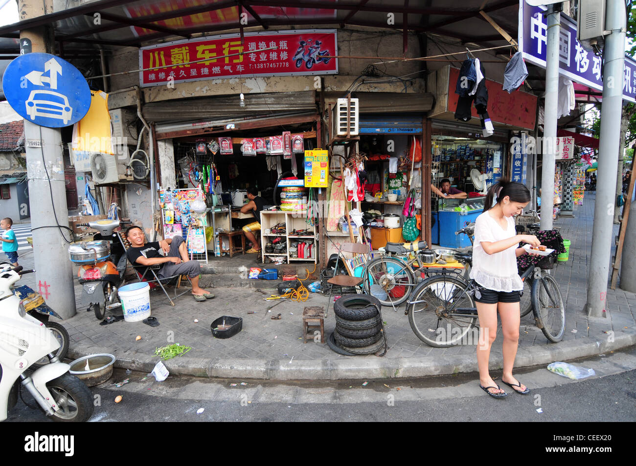 Shanghai class district street life Stock Photo - Alamy