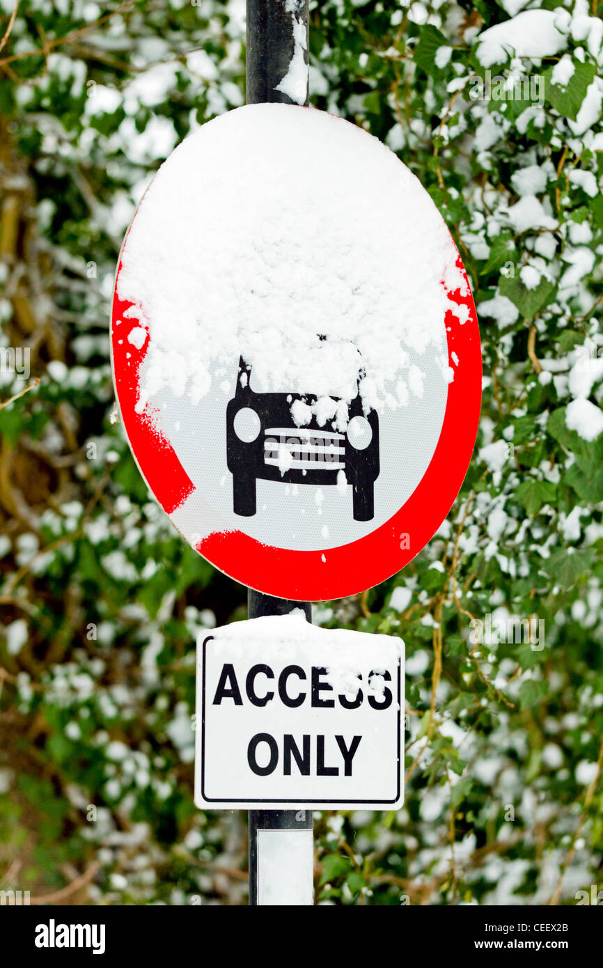 Access Only Sign covered in snow Stock Photo - Alamy