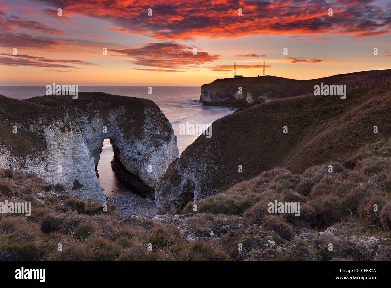 Dramatic sunrise over the Chalk Arch at Selwick Bay, Flamborough Head ...