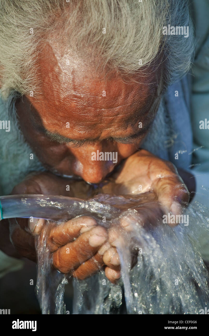Man drinking water, Rajasthan, India Stock Photo - Alamy